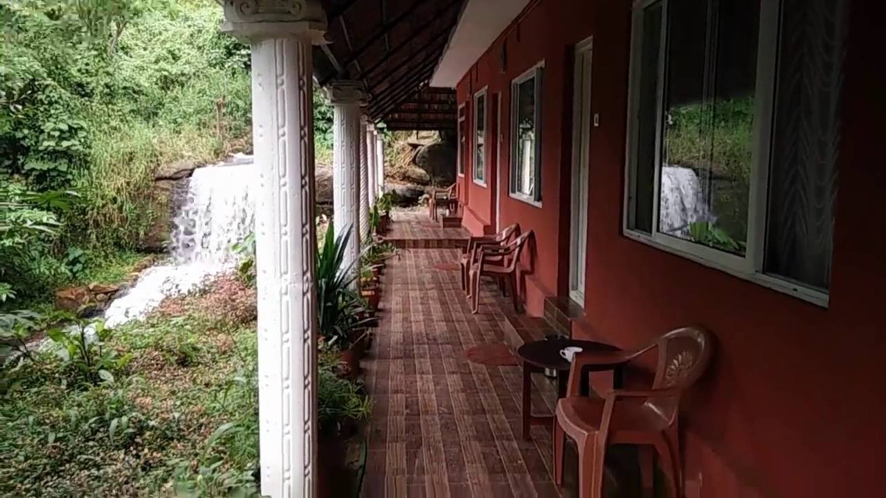 Whispering Falls resort Valparai - YouTube