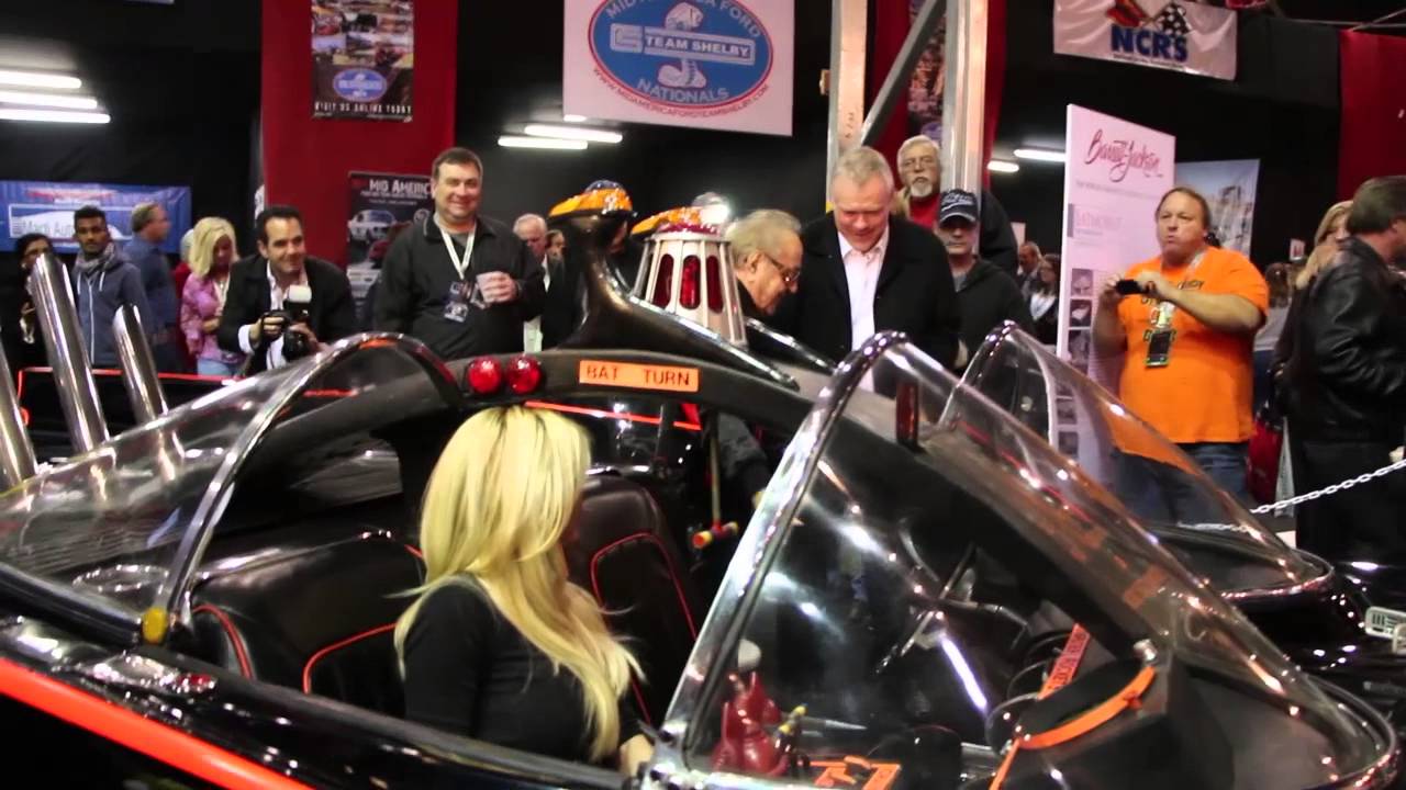 George Barris with April Rose and Craig Jackson at Barrett-Jackson ...
