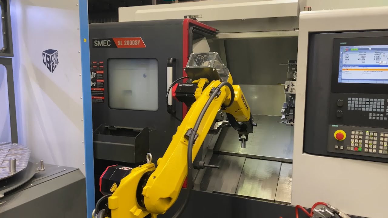 CubeBOX Blues RT-12 with SMEC SL 2000SY Machine Tending Application - YouTube