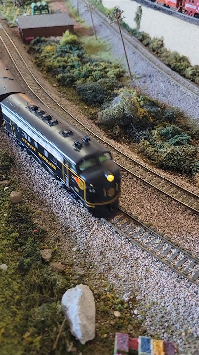 A small passenger train running on the Ho scale layout at the Hagerstown Model Railroad Museum ...
