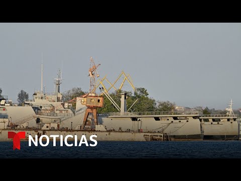 Acusan a tripulantes de lancha baleada de portar armas | Noticias Telemundo