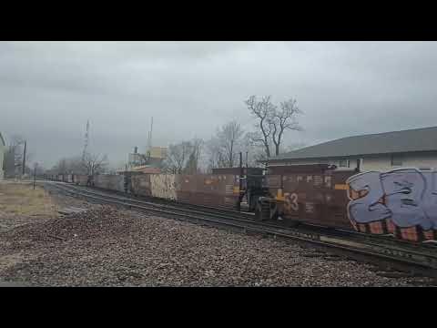 BNSF 6387 leads a long Baretable train through Coal City, IL - YouTube