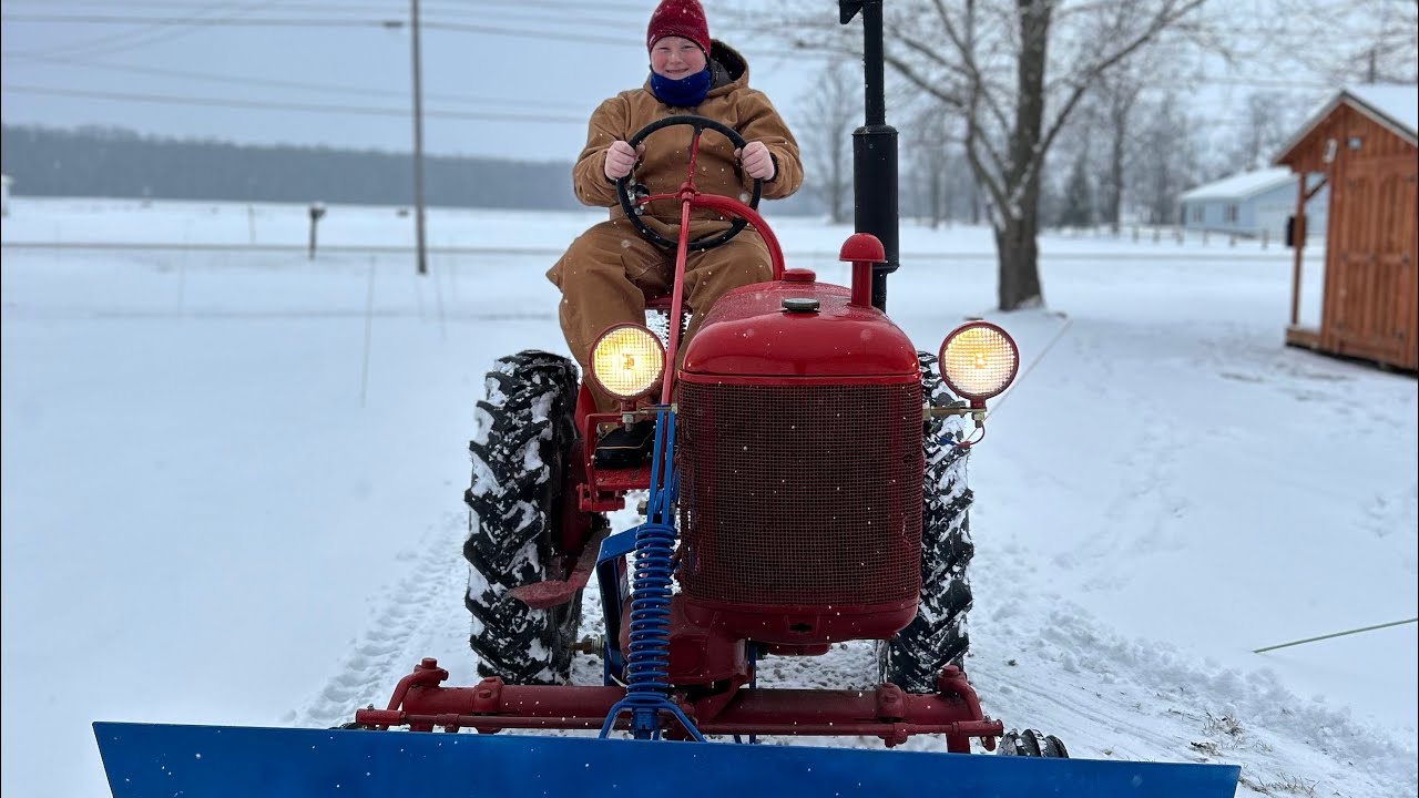 Farmall cub snow plowing the movie - YouTube