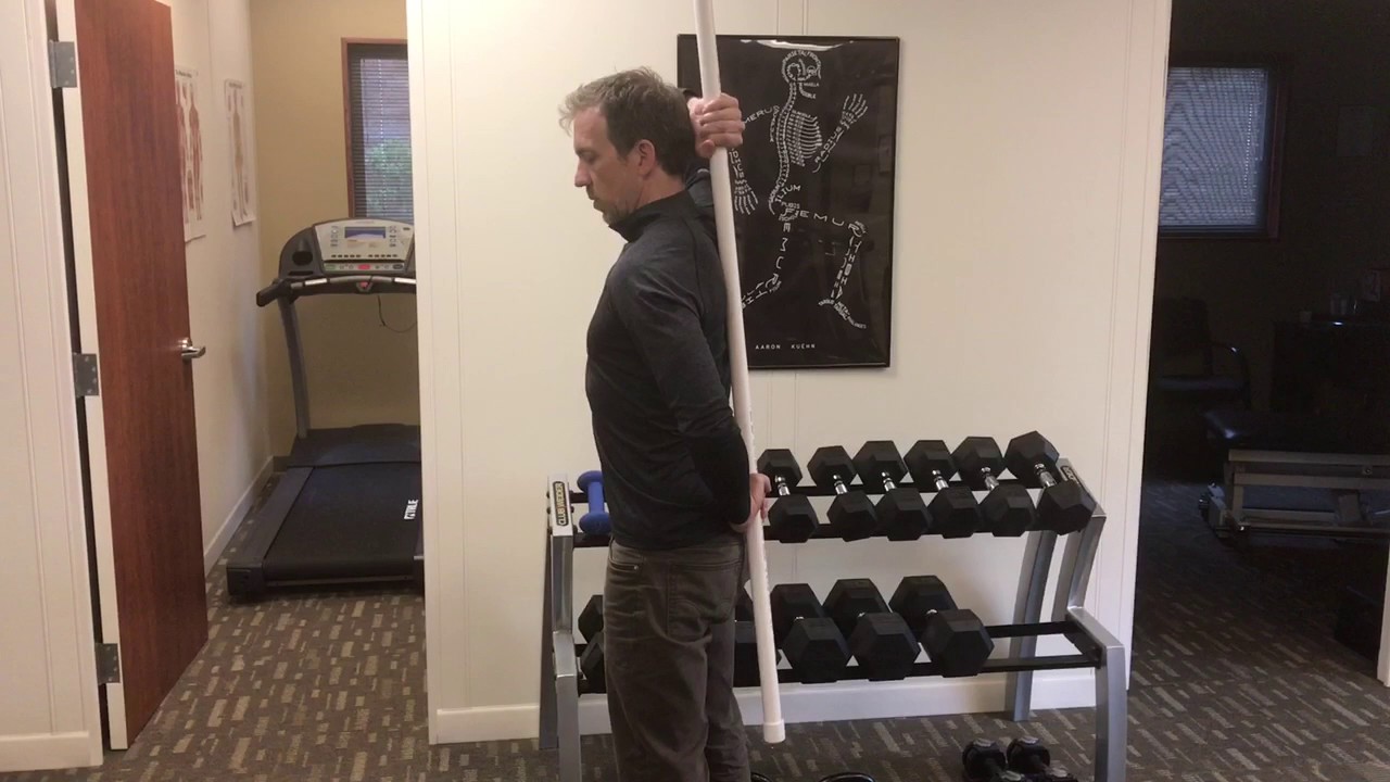 Shoulder IR and ER stretch with bar - YouTube