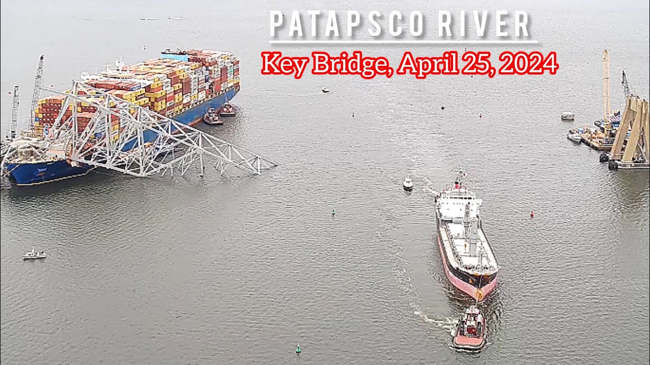 a ship passes through the newly opened channel on the Patapsco River ...