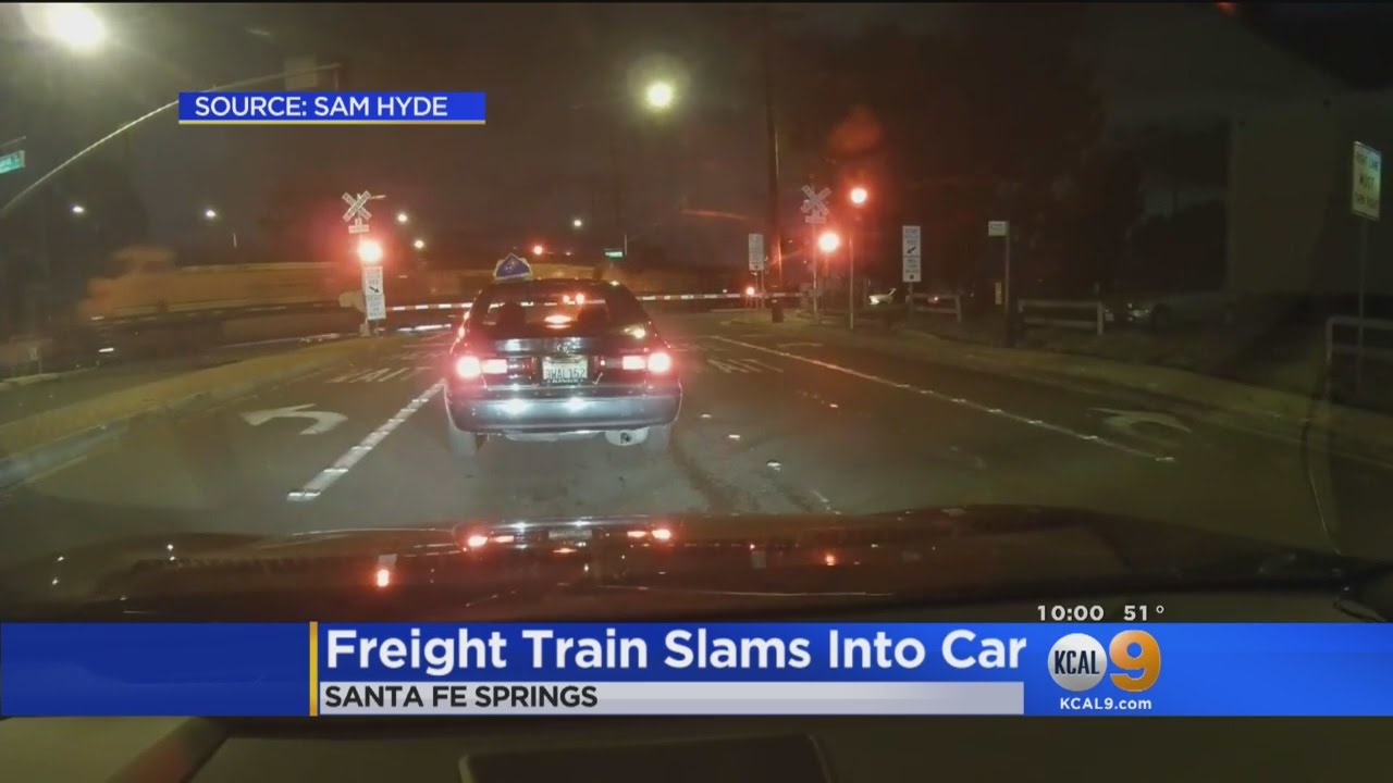 Firefighters Rescue Driver Stranded On Train Tracks - YouTube