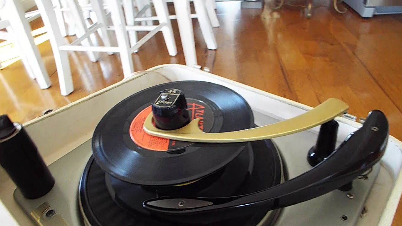Magnavox STEREO record player playing a stack of 33 LP records. - YouTube