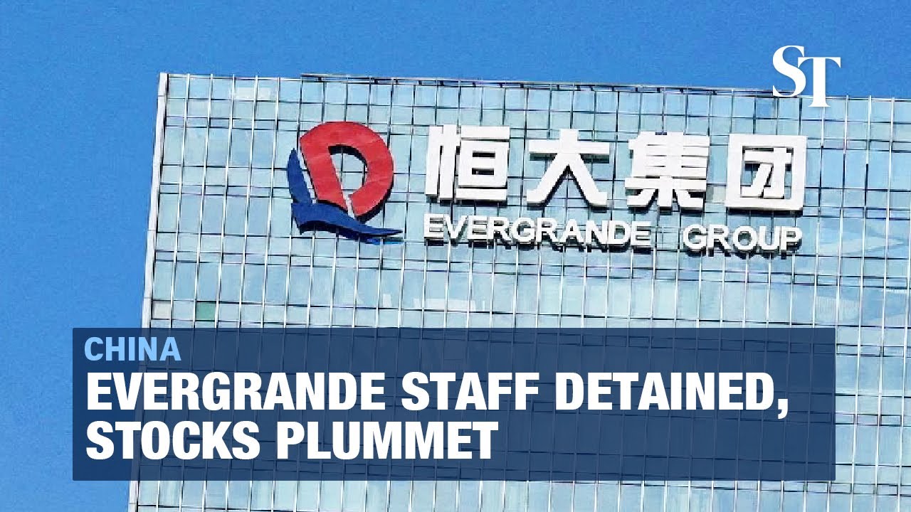 China Evergrande stock tumbles after staff detained - YouTube