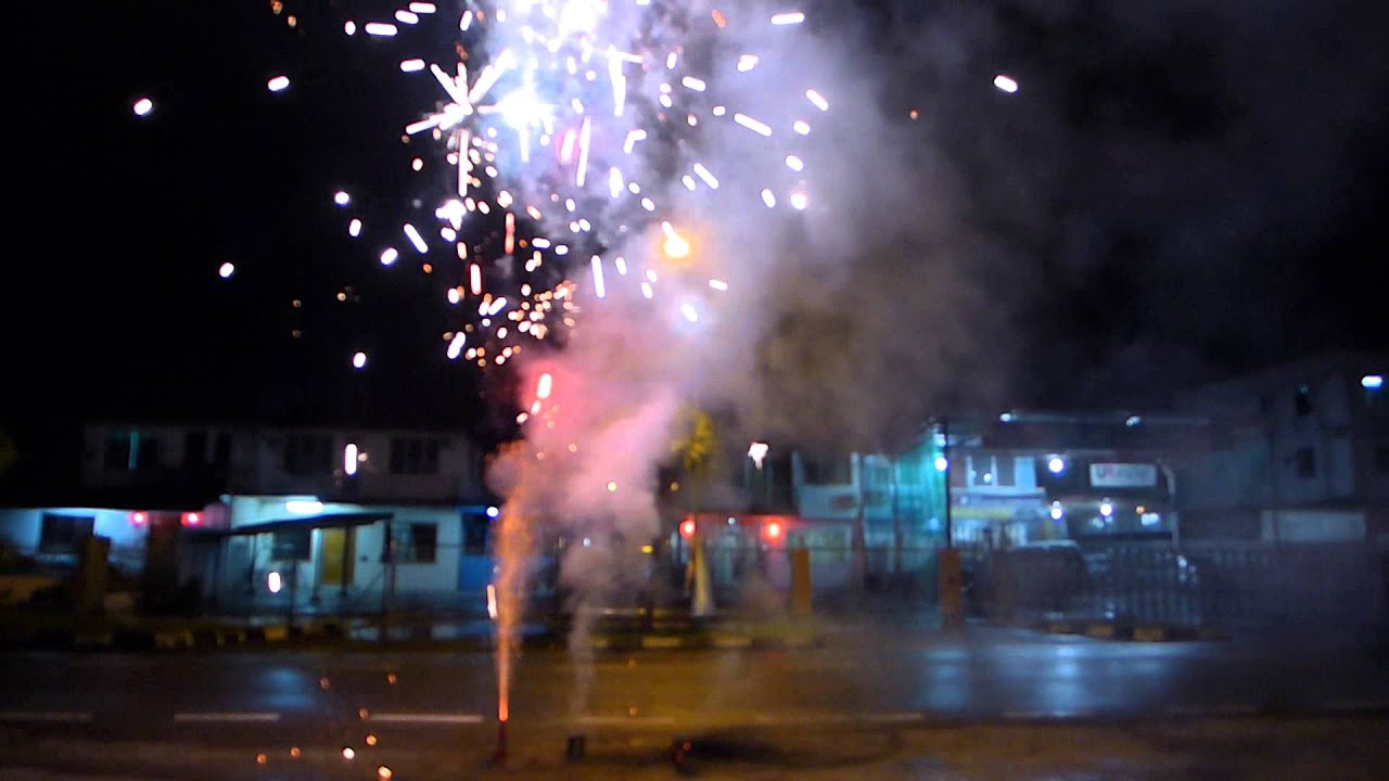 Two fountains with a fireworks cake set off simultanously - YouTube