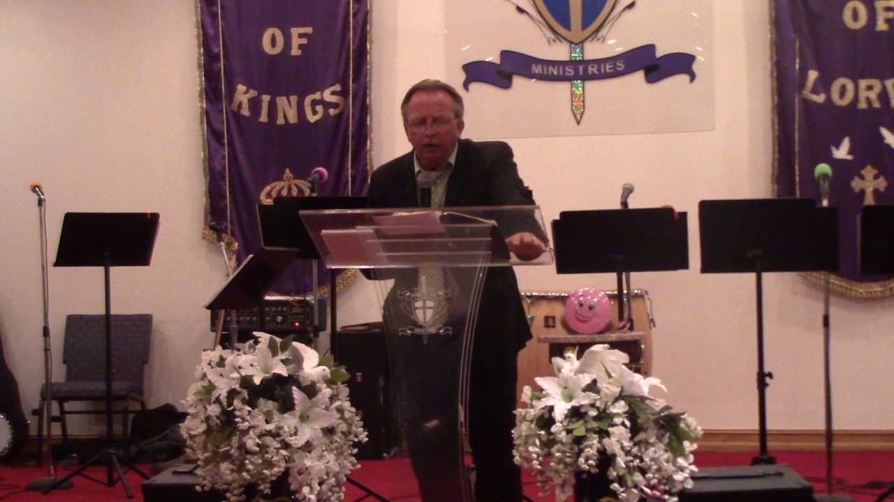 Pastor Jerry Foster preaching at the "Word of God Ministries" church ...