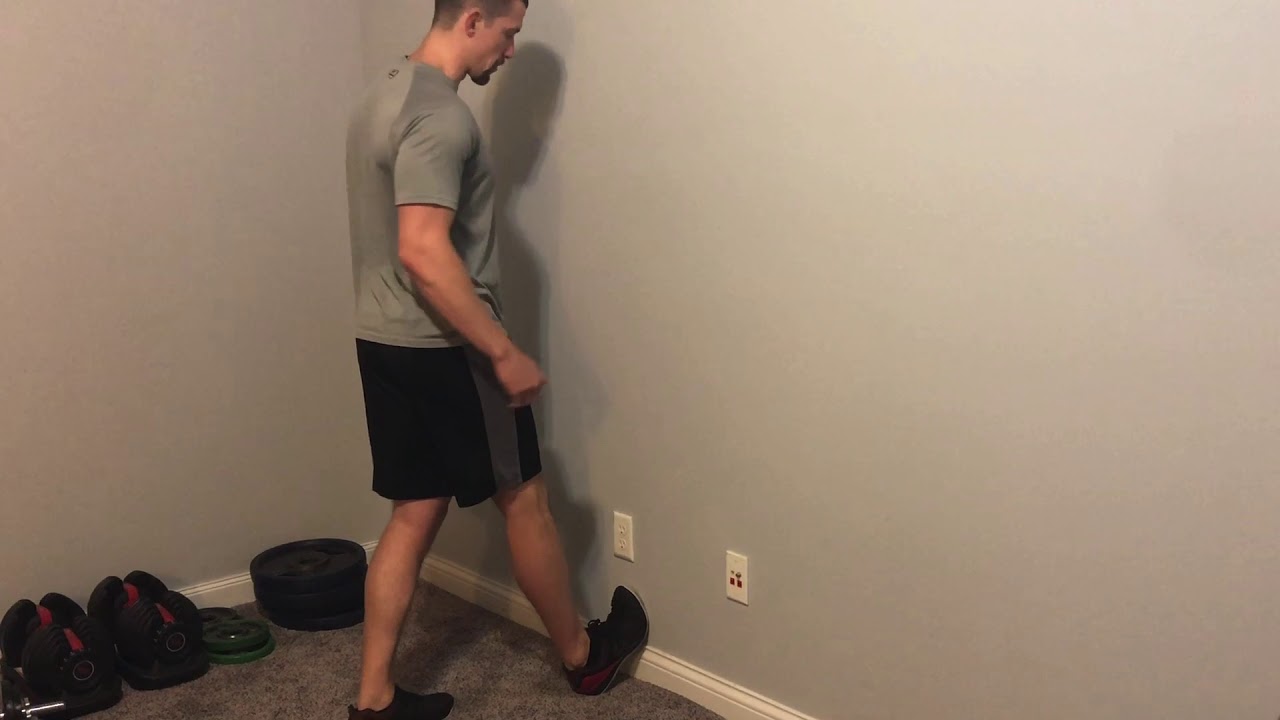 Standing Hamstring stretch on the wall - YouTube