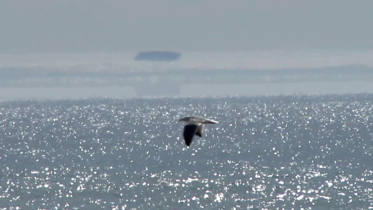 Very unusual superior mirage of a ship and the sea surface, October 7 ...
