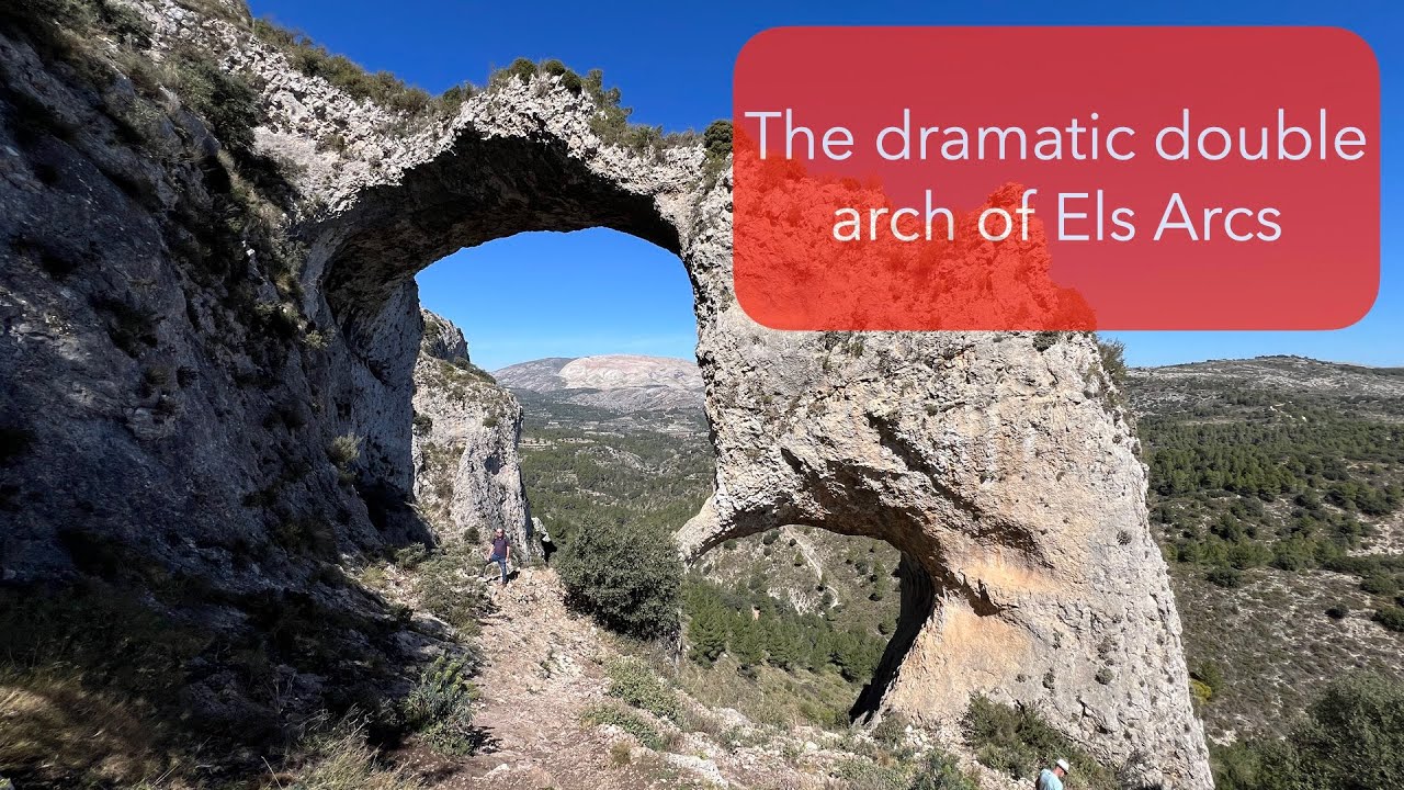 The dramatic double arch of Els Arcs - YouTube