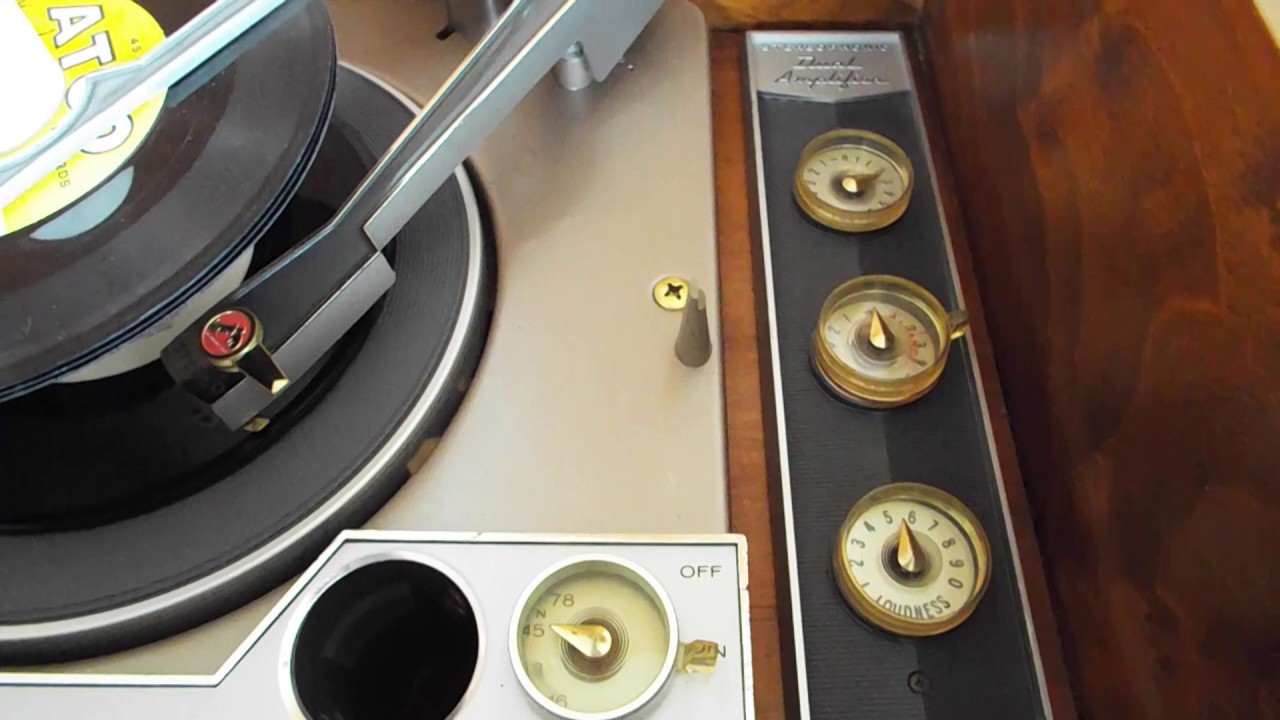 RCA Victor stereo record player playing a stack of 45 rpm records - YouTube