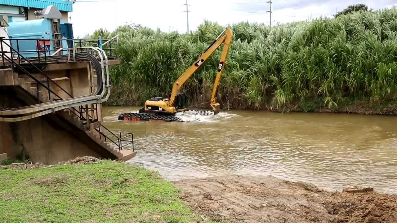 V & V Contracting Co Ltd desilting a river - YouTube