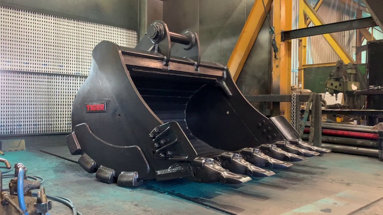 TIGER HEAVY DUTY BUCKET IN ACTION! - YouTube