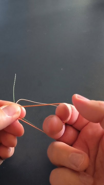 An easy way to tie two fishing lines together - YouTube