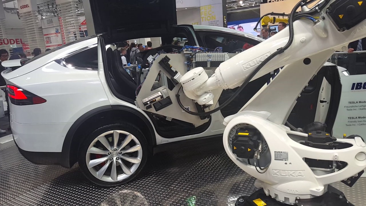 KUKA is assembling Tesla model X / HMI2017 - YouTube
