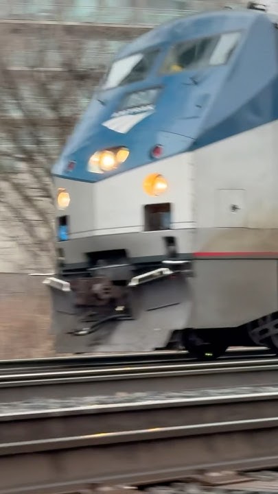Via 97 with Amtrak p42 132 flying by the spot - YouTube