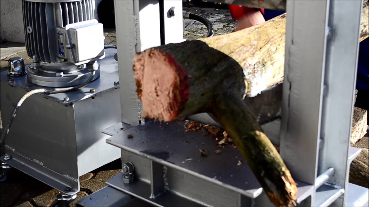Small homemade hydraulic firewood guillotine - YouTube