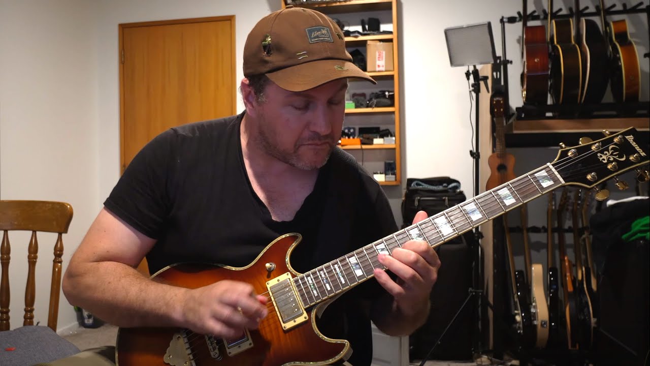 Nick Granville playing a Robben Ford style track (help the poor). - YouTube