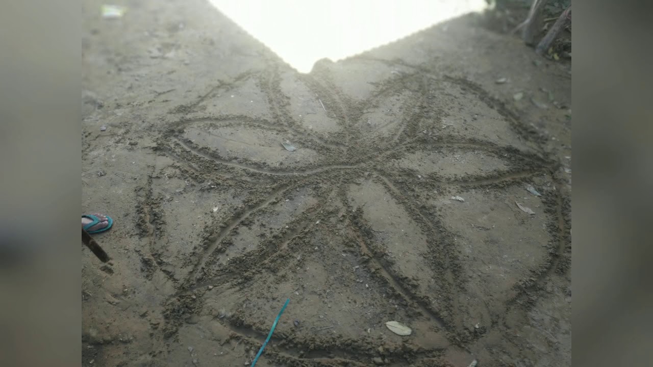 Soil art on earth with wood - YouTube