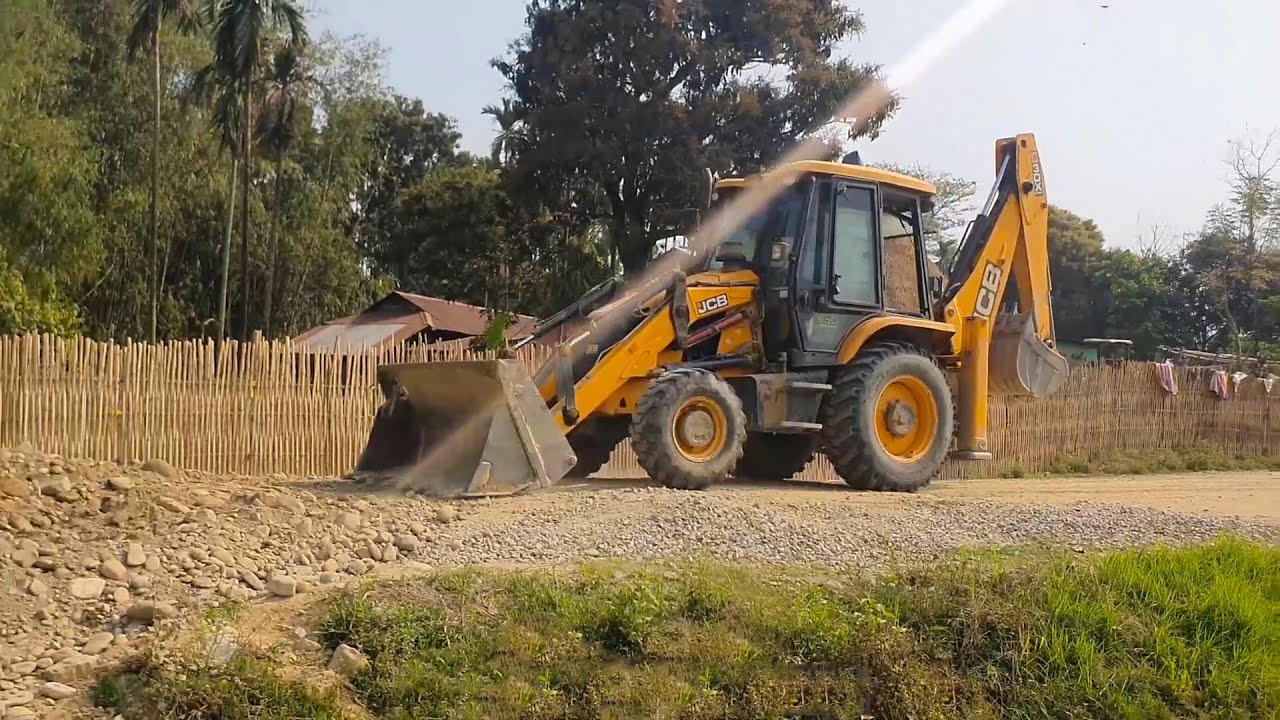 JCB Backhoe in Action | Digging and Smoothing Village Road 🚜 - YouTube