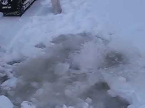 Water gushing out of punctured hole in the Slave River ice cover - YouTube
