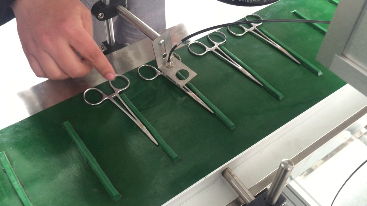 Fiber laser marking machine for surgical instrument - YouTube