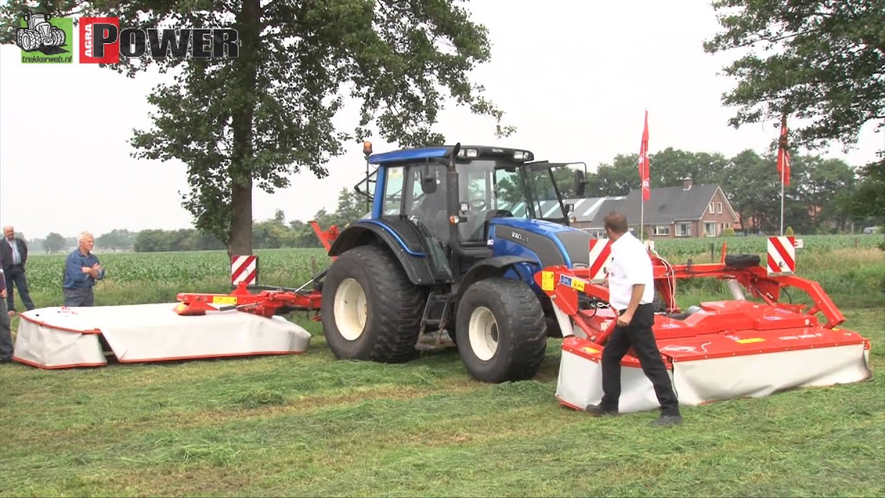 Valtra met Kuhn GMD 8730 en GMD 802 F triple maaier - YouTube