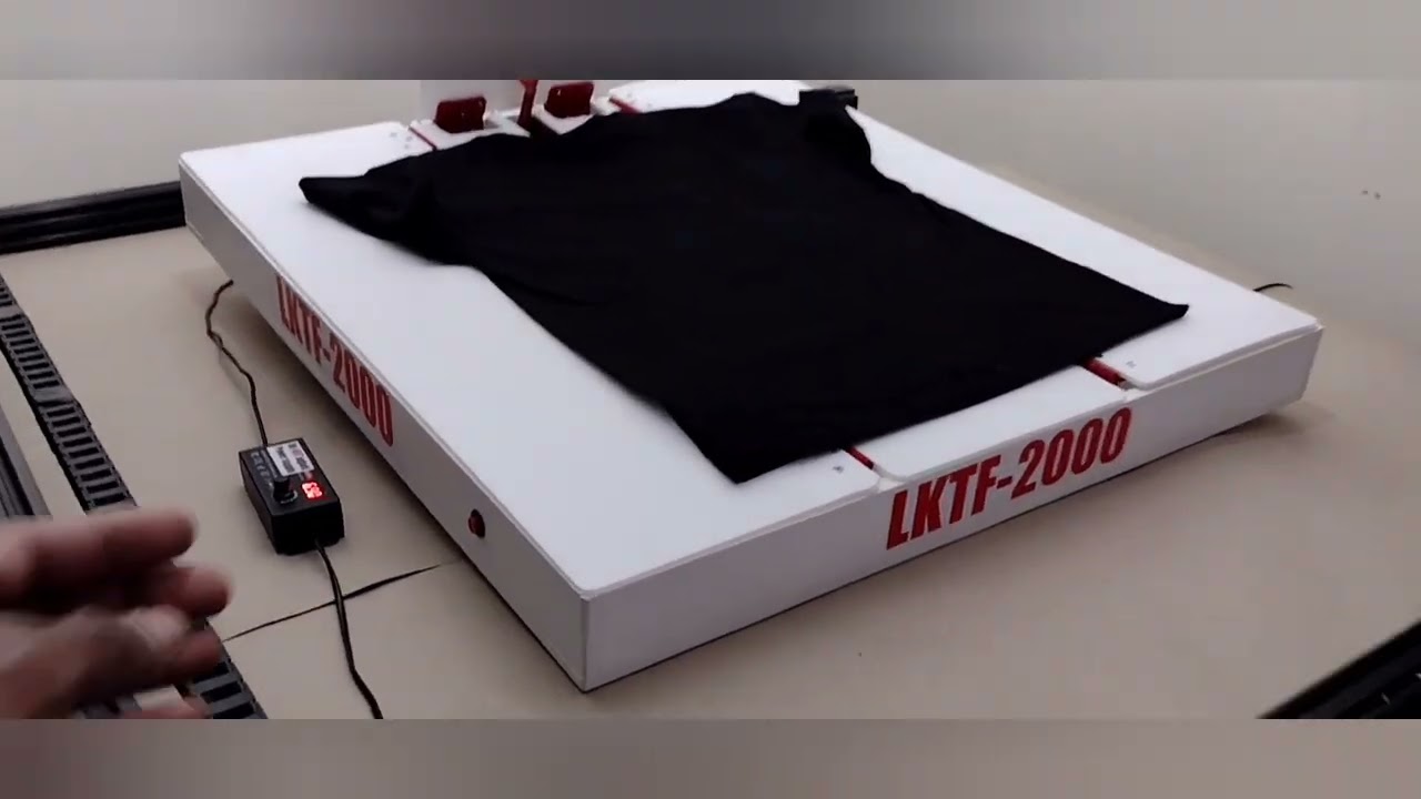 electric automatic t-shirt folding machine 2022 - YouTube