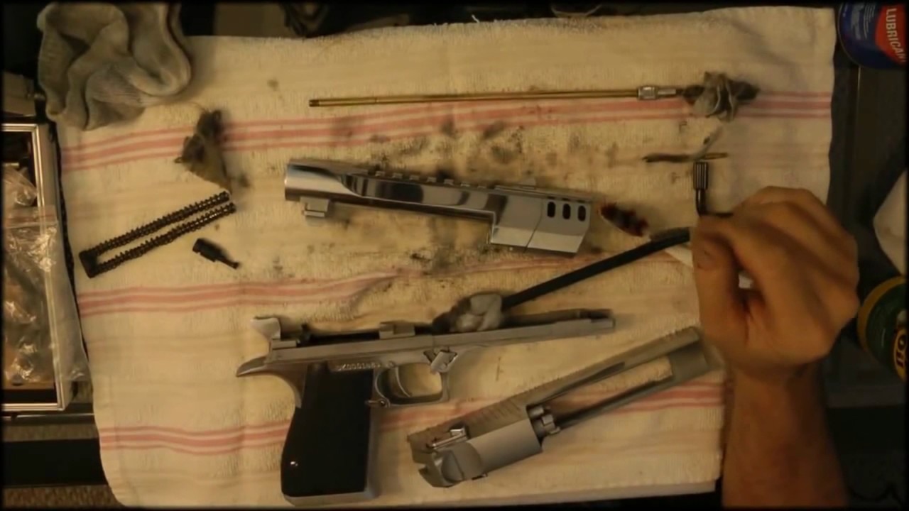 DESERT EAGLE CLEANING OF A CHROME AND TITANIUM GOLD - YouTube