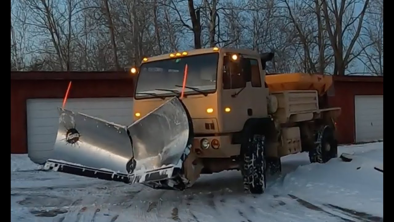 M 1078 plowing with the Fisher 10' 6" XV2 - YouTube
