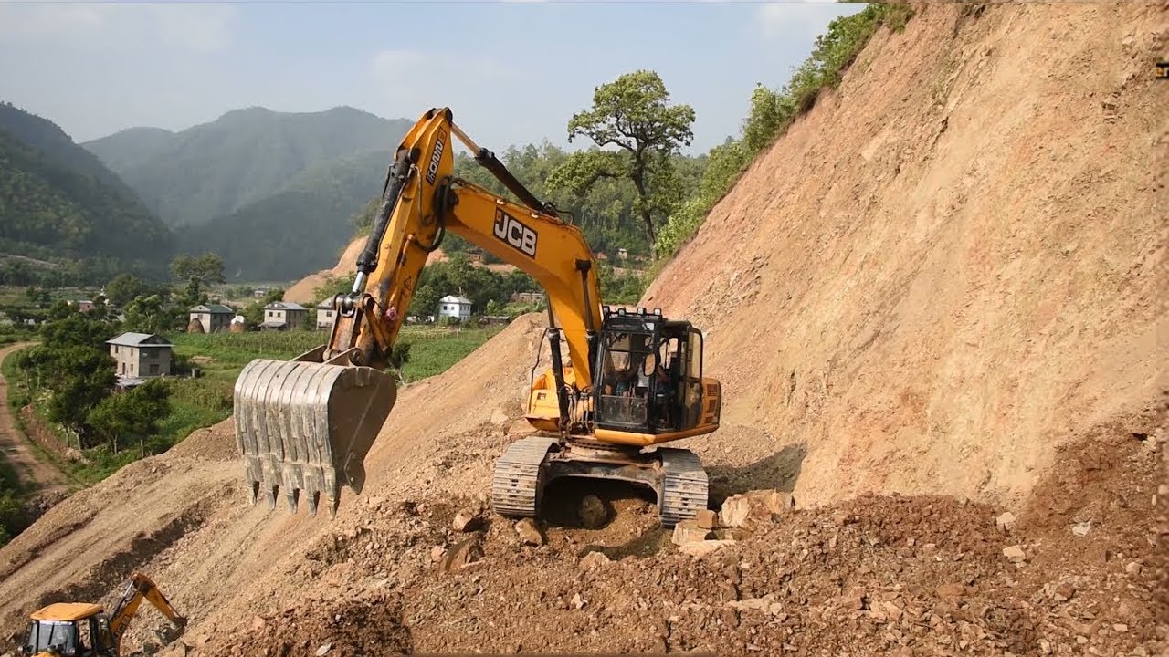 JCB Backhoe, Big Machines Constructing Road in Hill Area - Backhoe ...