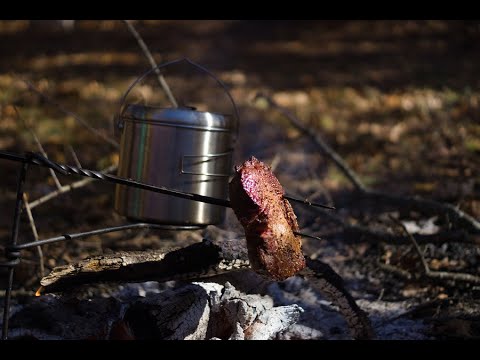 Campfire roast cooked on a squirrel cooker - YouTube