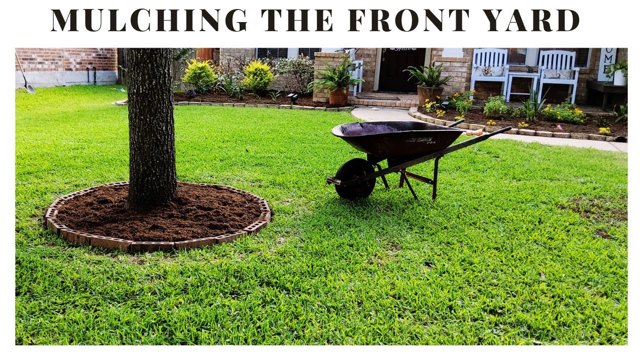 Putting down mulch in the front yard. - YouTube