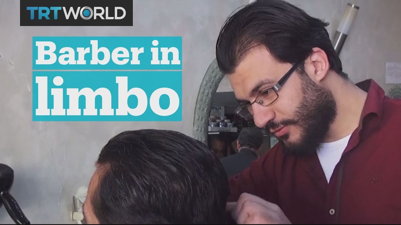 Syrian barber stuck in legal limbo in Tunisia - YouTube