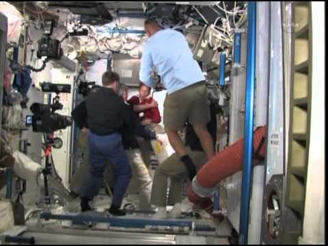 STS-135 - Atlantis - ISS Crew Hatch Opening and Welcome Ceremony +.asx - YouTube