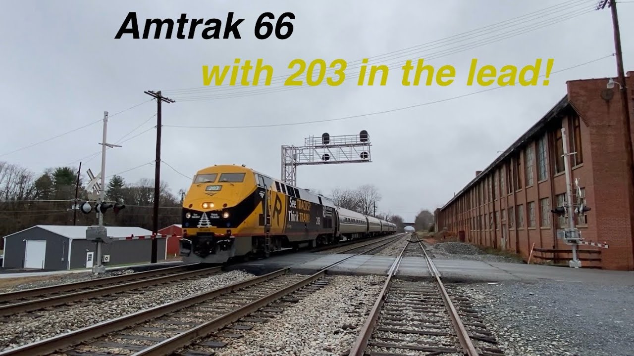 Amtrak 66 flys east with Amtrak 203 in the lead with a friendly ...