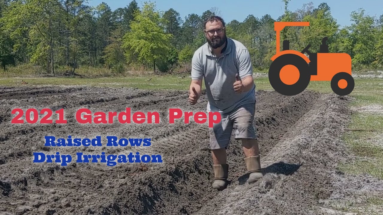 Building raised rows & laying drip tape | 2021 Spring Market Garden ...