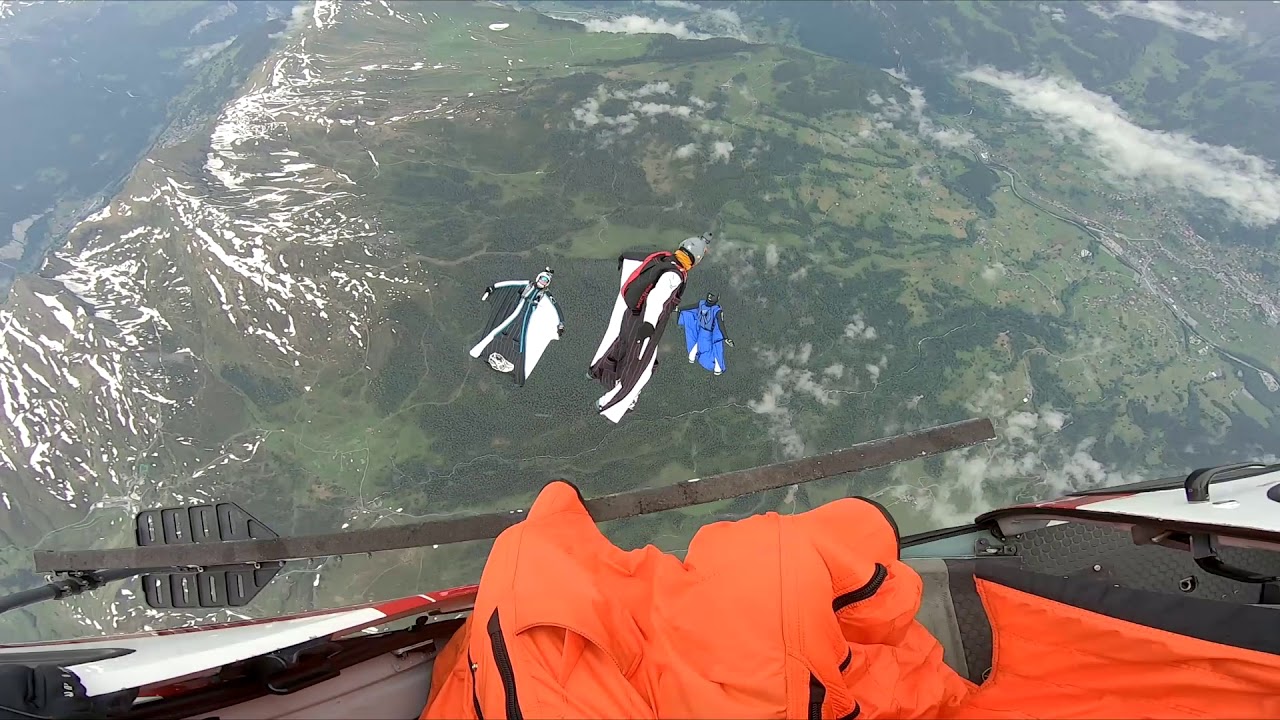 Wingsuit heli skydive jump Mt. Eiger - YouTube