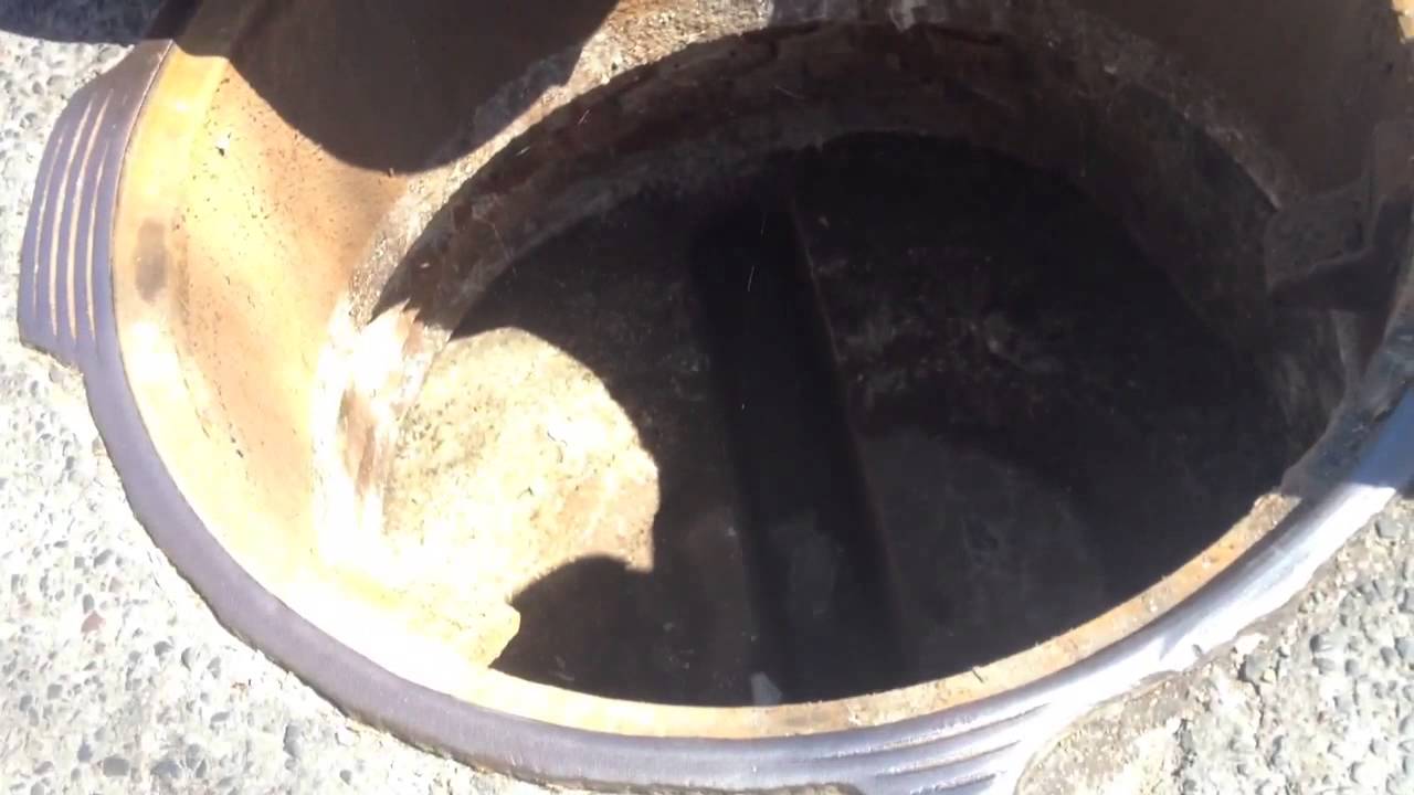 Sanitary sewer manhole open - YouTube