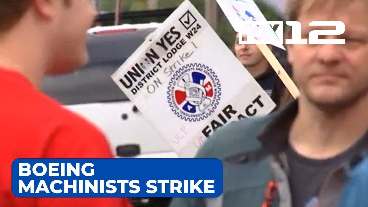 Boeing machinists strike outside Portland facility - YouTube