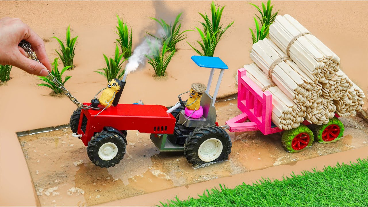 DIY Mini Tractor Transports Popsicle Sticks to Build a Fence ...