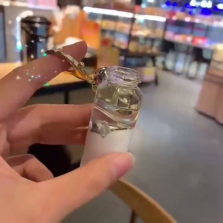 bubble keychains Floating Pig Milk Bottle - YouTube