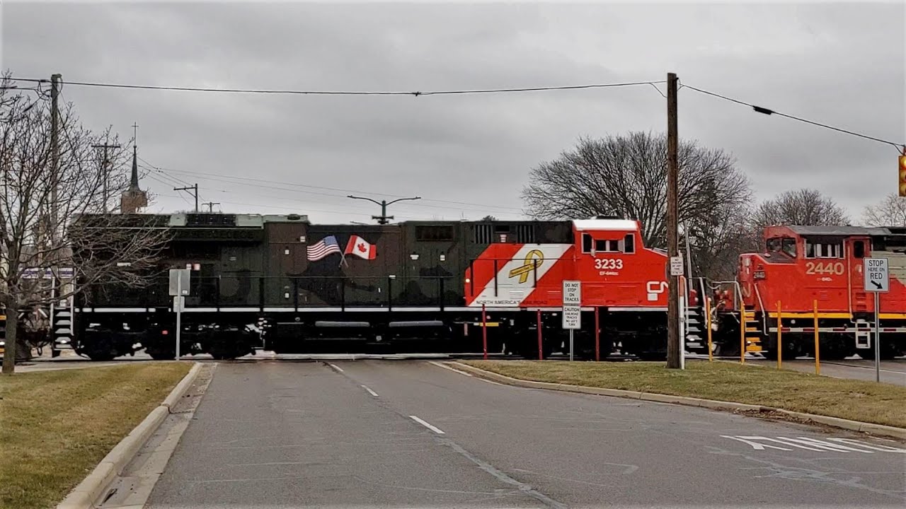 CN A492 with CN 3233 Veterans Unit, CN 2440 C40-8M Cowl in East Lansing ...