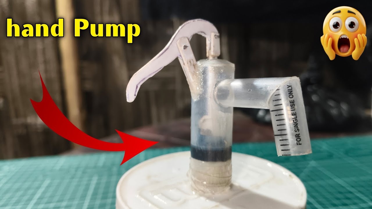 How to make hand water pump at home .Hand pump using syringe - YouTube