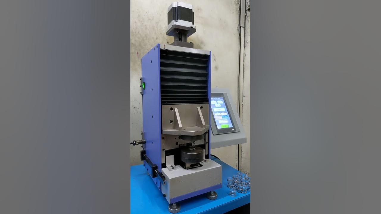 spring load testing machine - YouTube