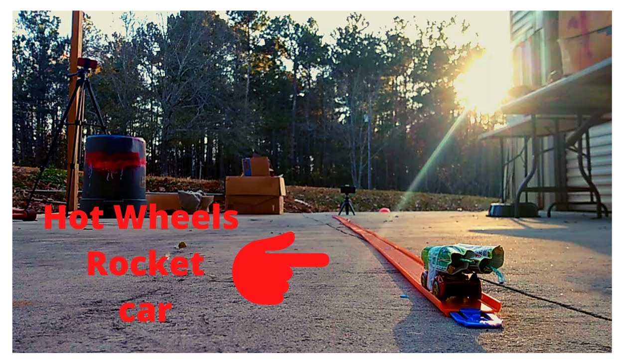 1/64th scale racing hot wheels car blasting down the hot wheels track ...