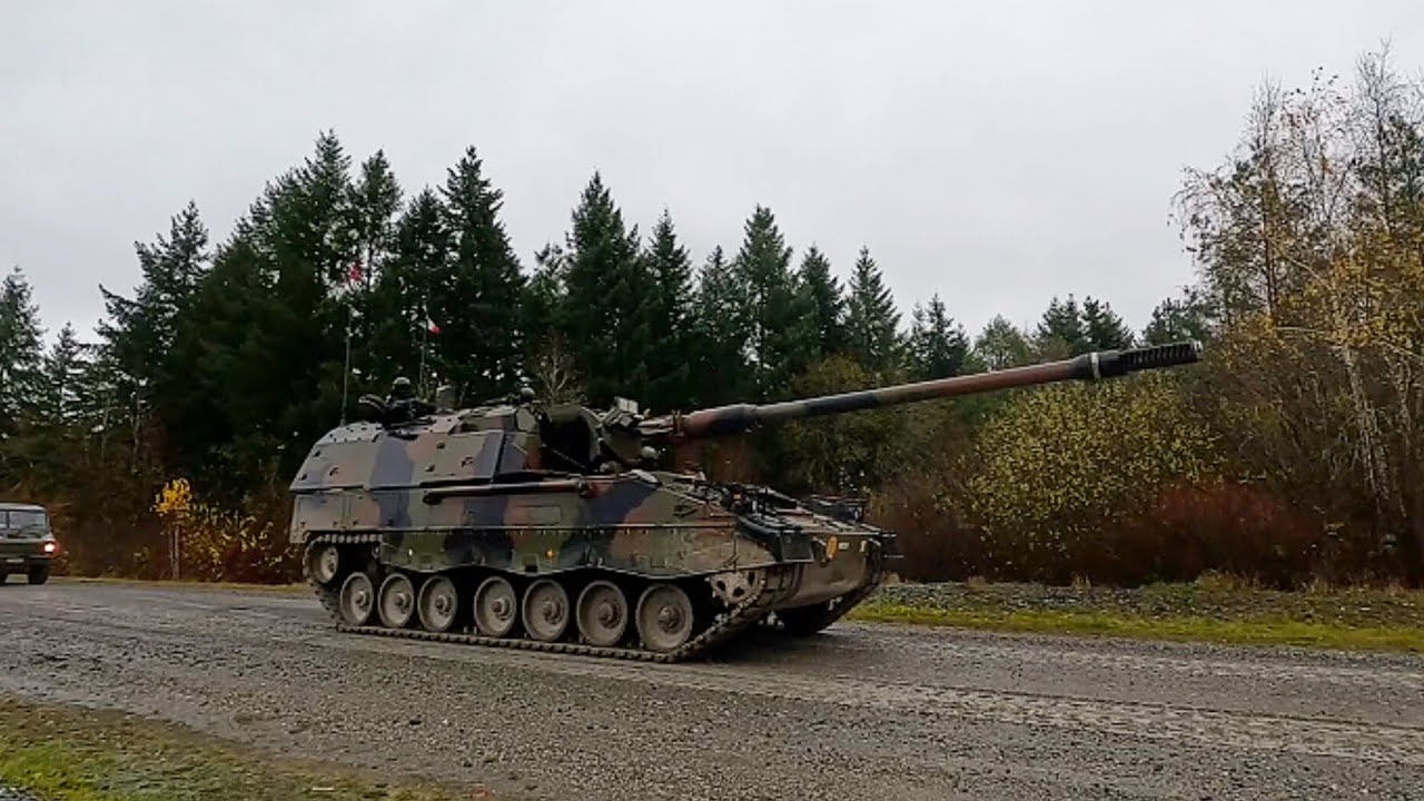 Italian tank returns to base after completing live live fire during ...